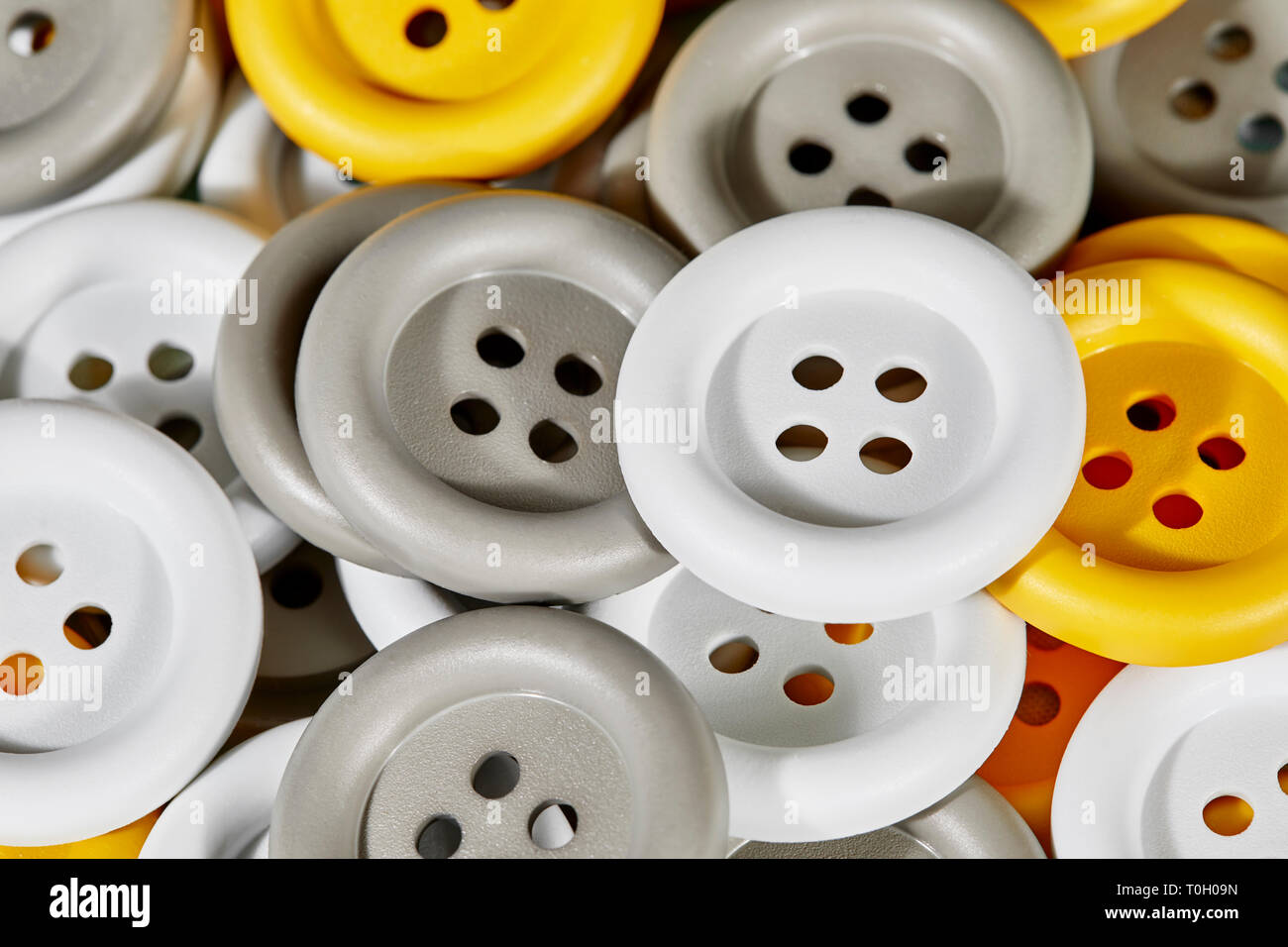 Yellow buttons hi-res stock photography and images - Alamy