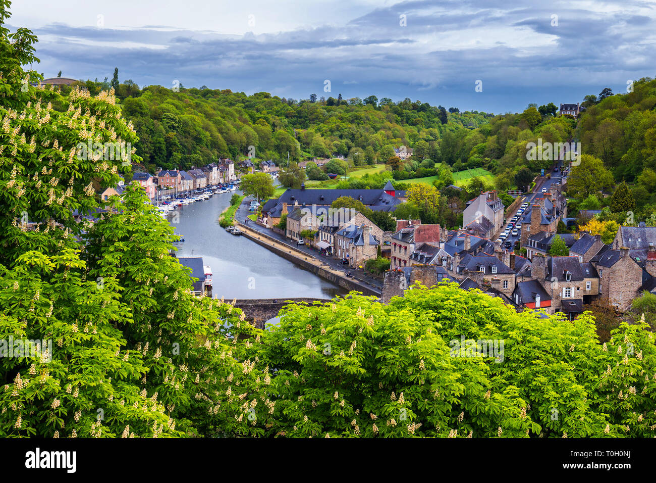 Aerial view of the historic town of Dinan with Rance river with ...