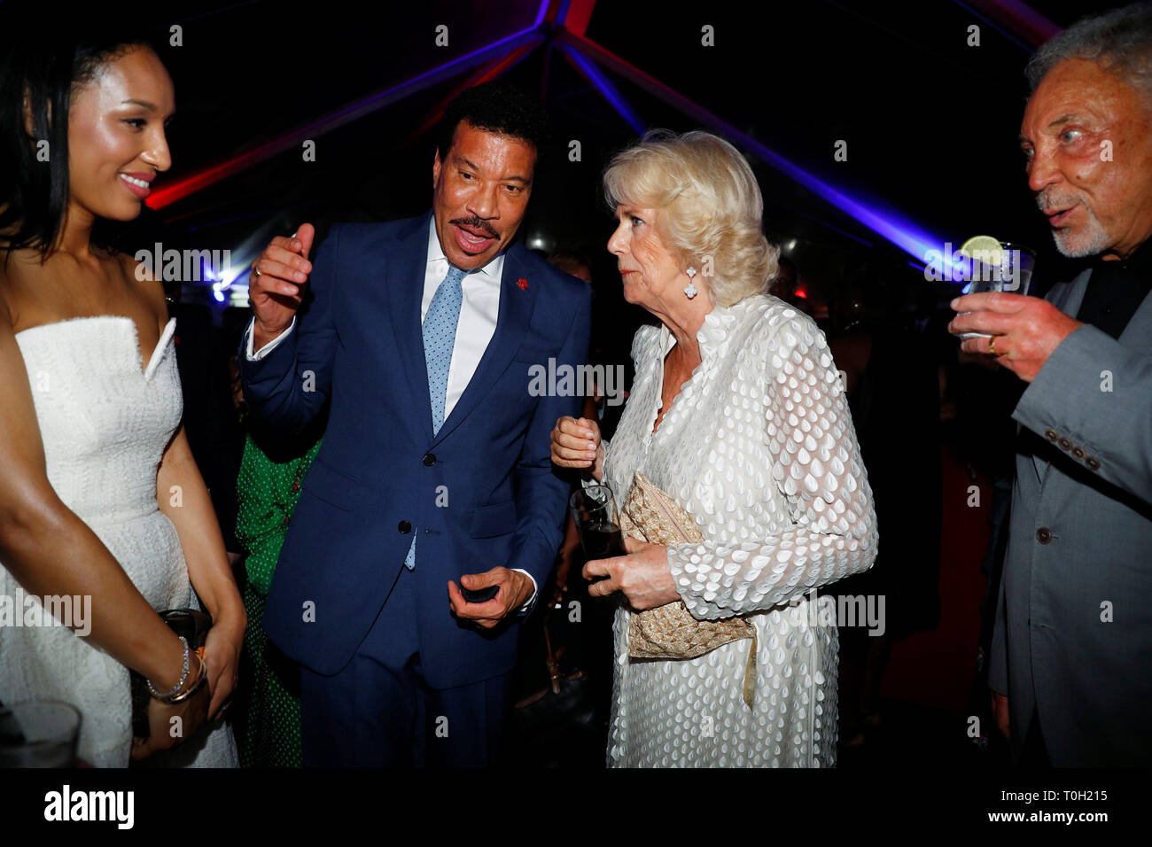The Duchess of Cornwall talks to singer Lionel Ritchie as Lisa Parigi ...
