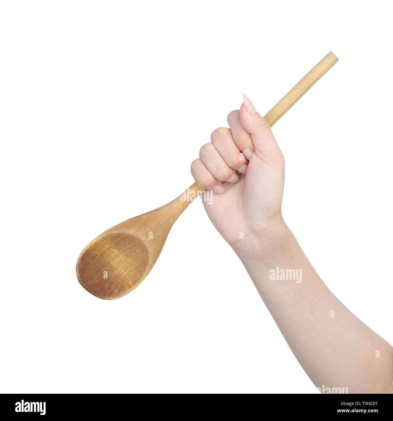 Wooden spoon in female hand isolated on white Stock Photo - Alamy