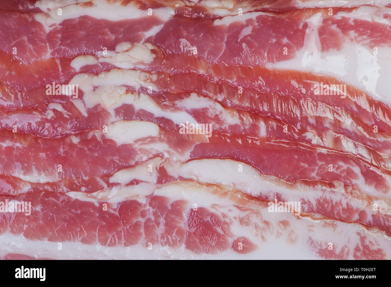 Slices of fresh bacon texture. Meat background Stock Photo - Alamy