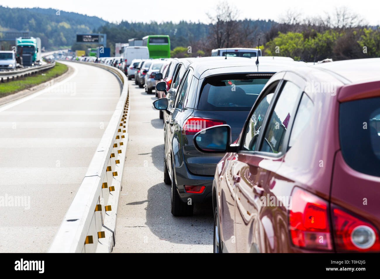 Traffic jam on highway during rush hour Stock Photo - Alamy