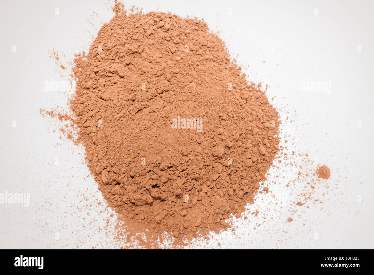 Dry cocoa powder poured in a mixing bowl Stock Photo - Alamy