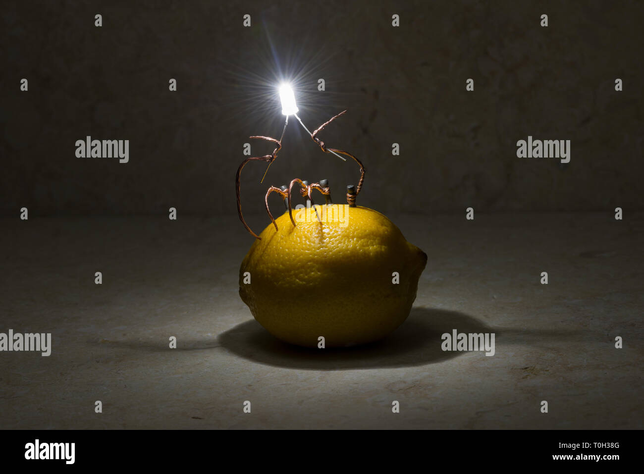 Citrus fruit, lemon, lime battery demonstrating an alternative organic ...