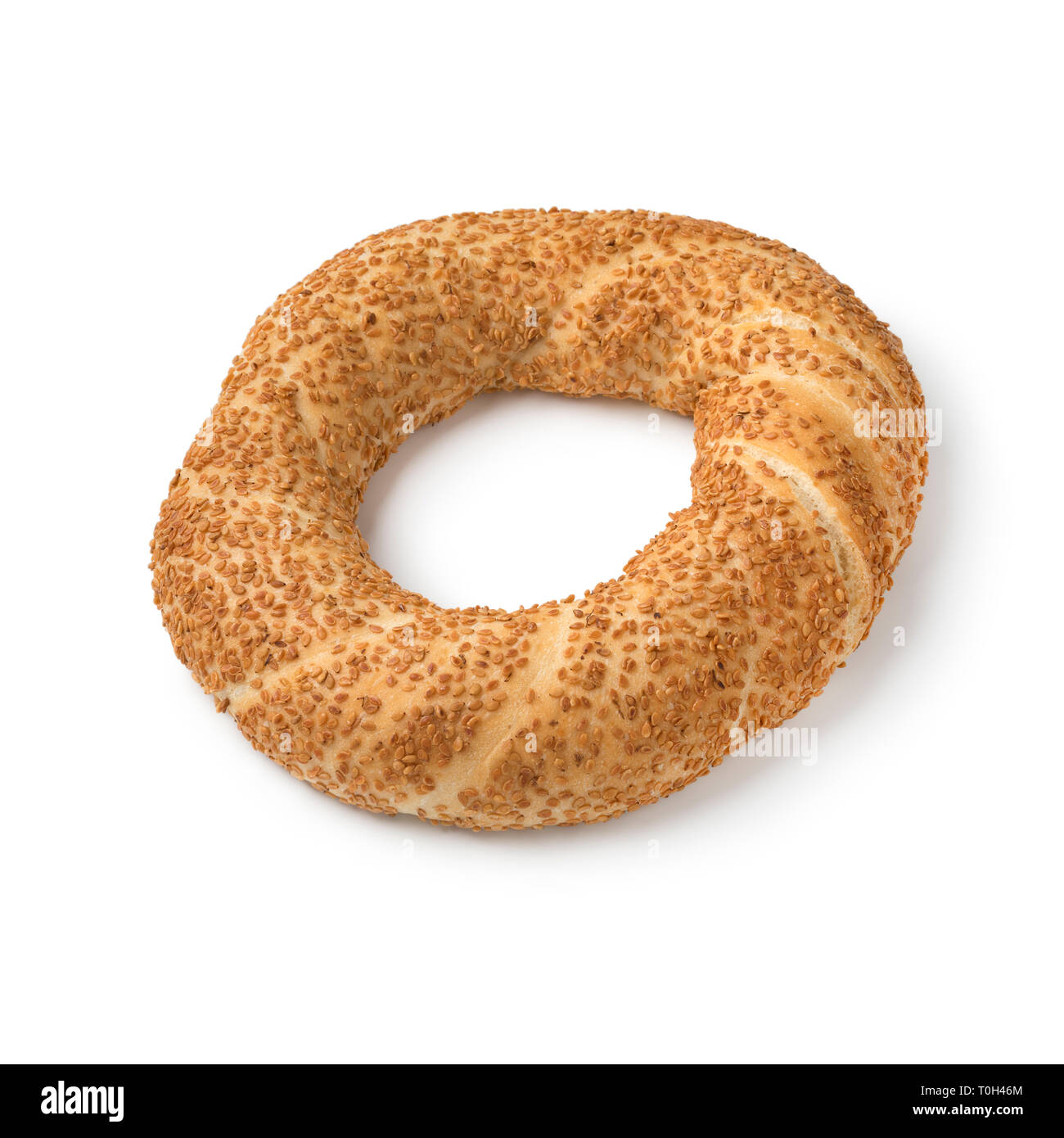 Single fresh baked Turkish simit isolated on white background Stock ...