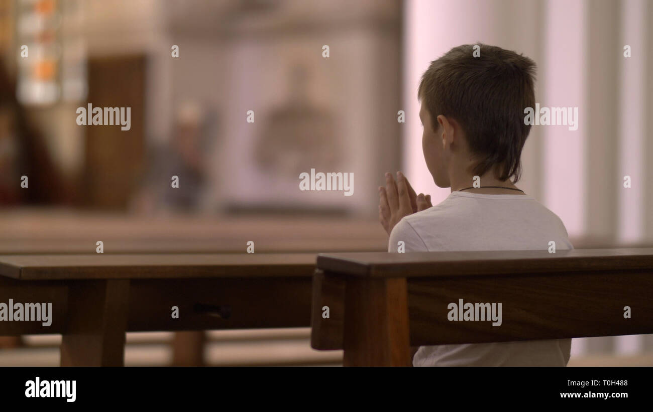 Praying Alone Catholic Church Stock Photos & Praying Alone Catholic ...