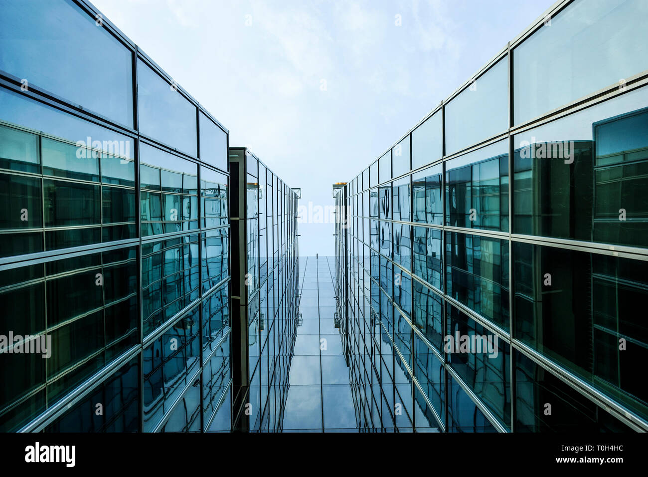 Building facade with blue sky . Amazing perspective Stock Photo - Alamy