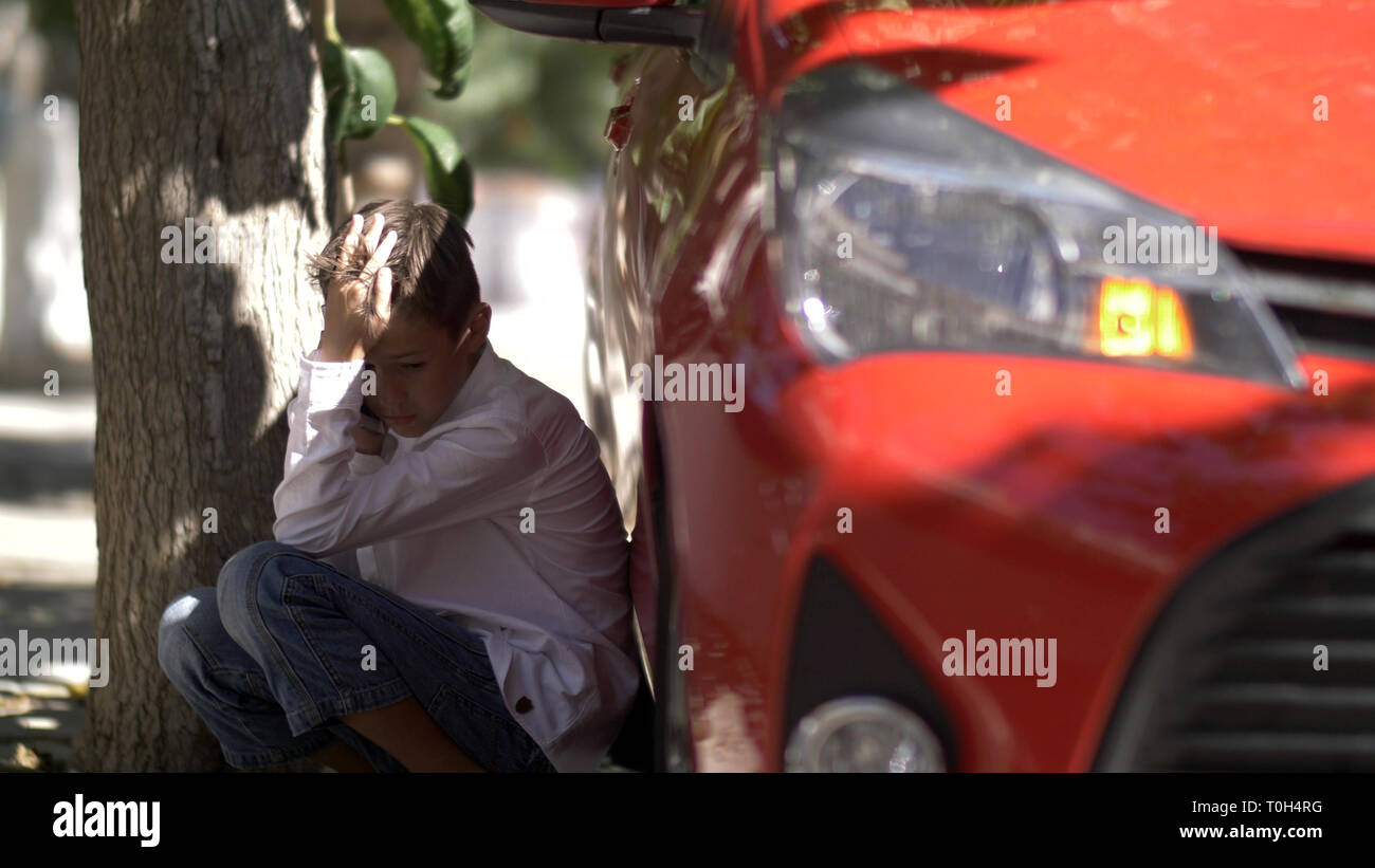 sad boy calls the rescue service car had an accident, have fun Stock ...