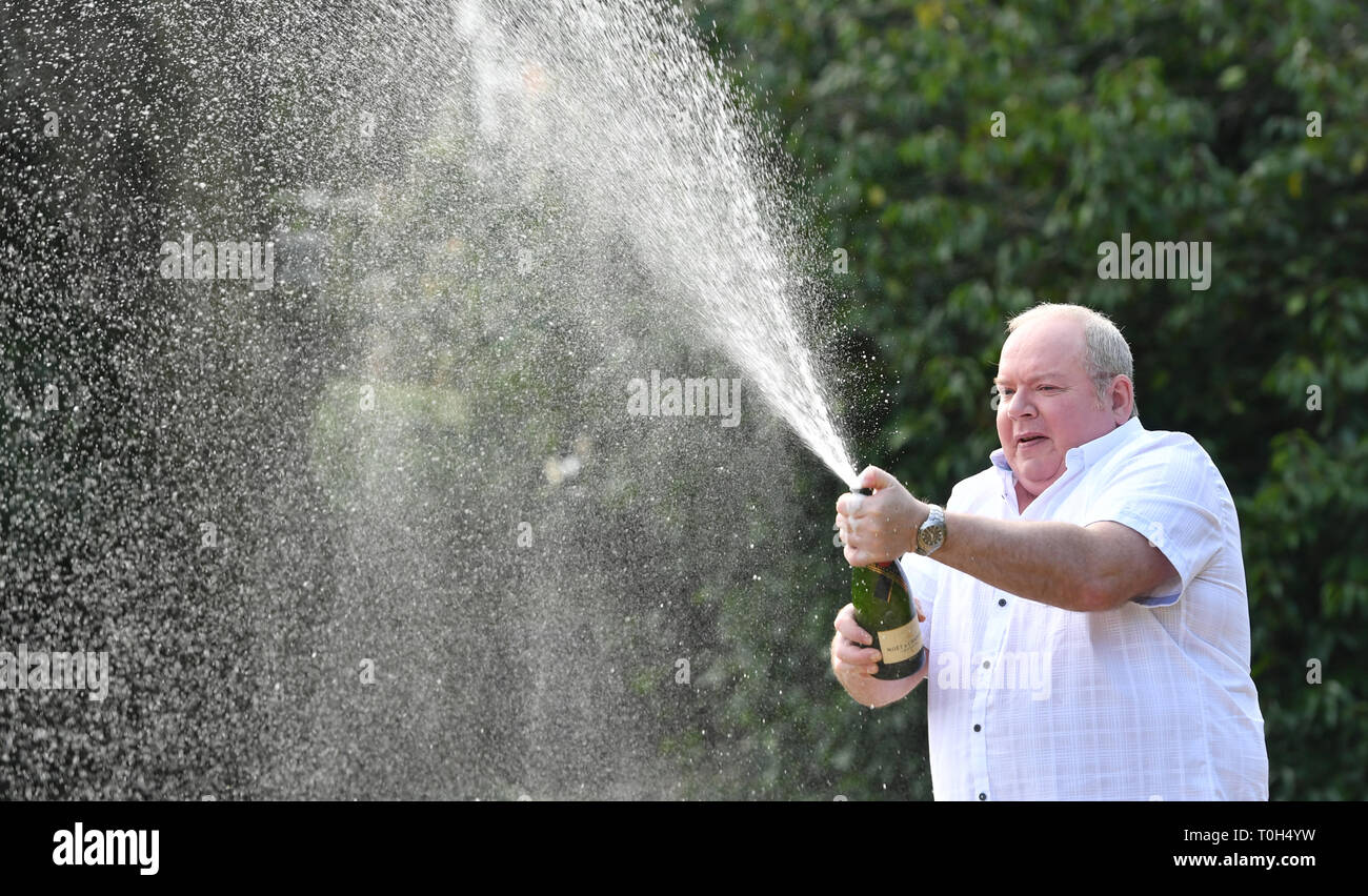 Ade Goodchild, 58, a factory worker from Hereford celebrates after ...