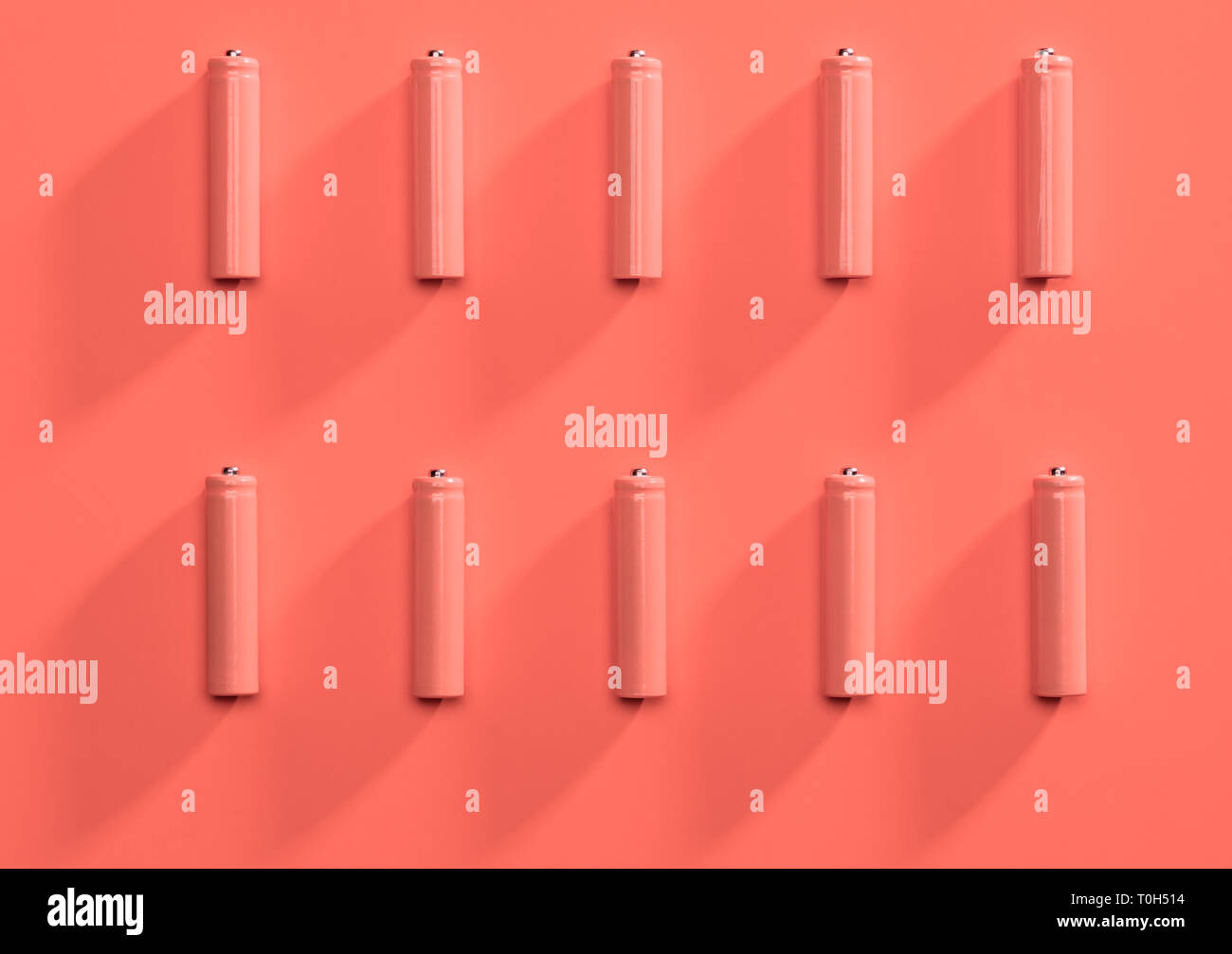 Top view coral trendy color AAA alkaline batteries colorful pop art ...