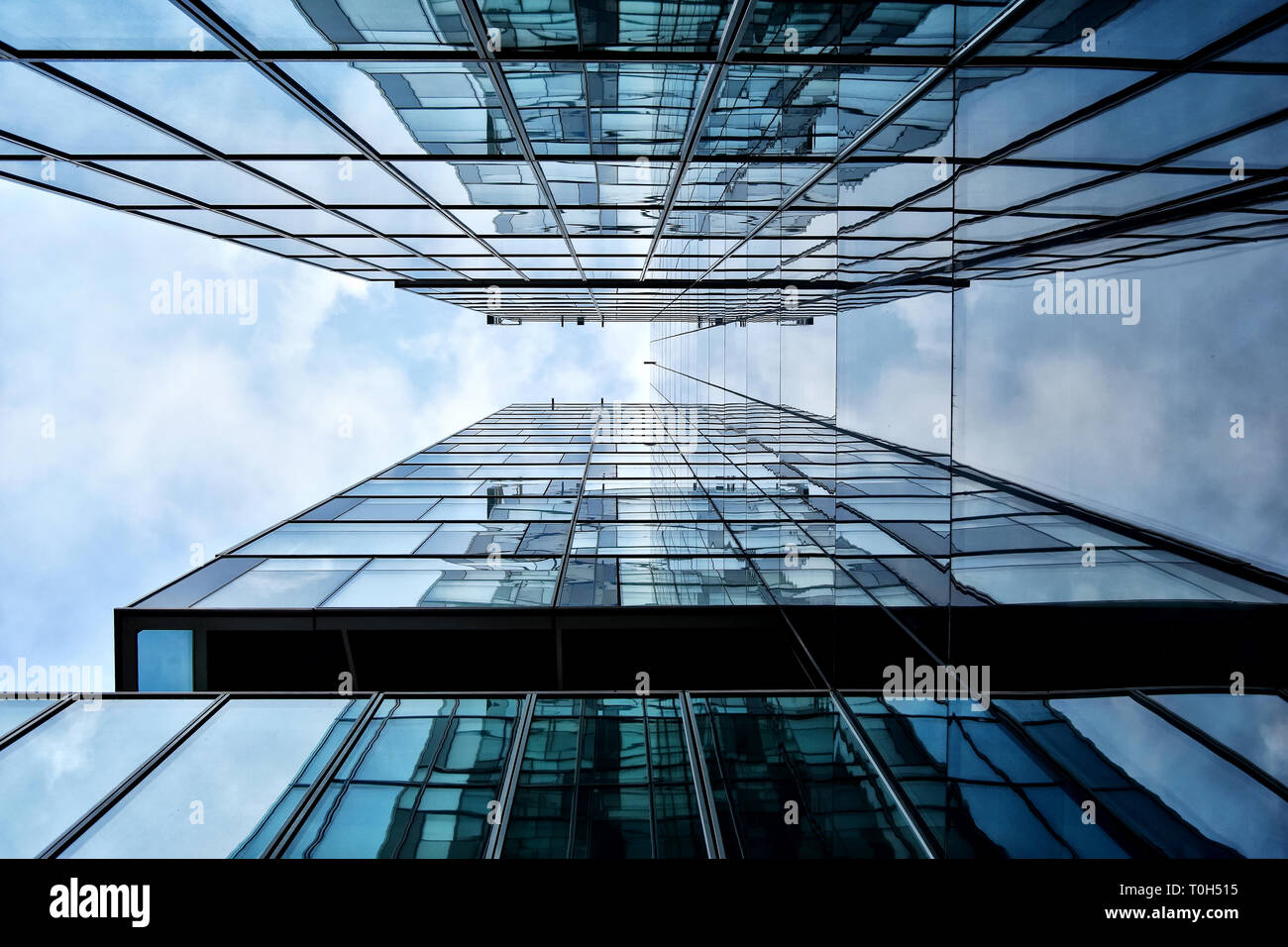 Building facade with blue sky . Amazing perspective Stock Photo - Alamy