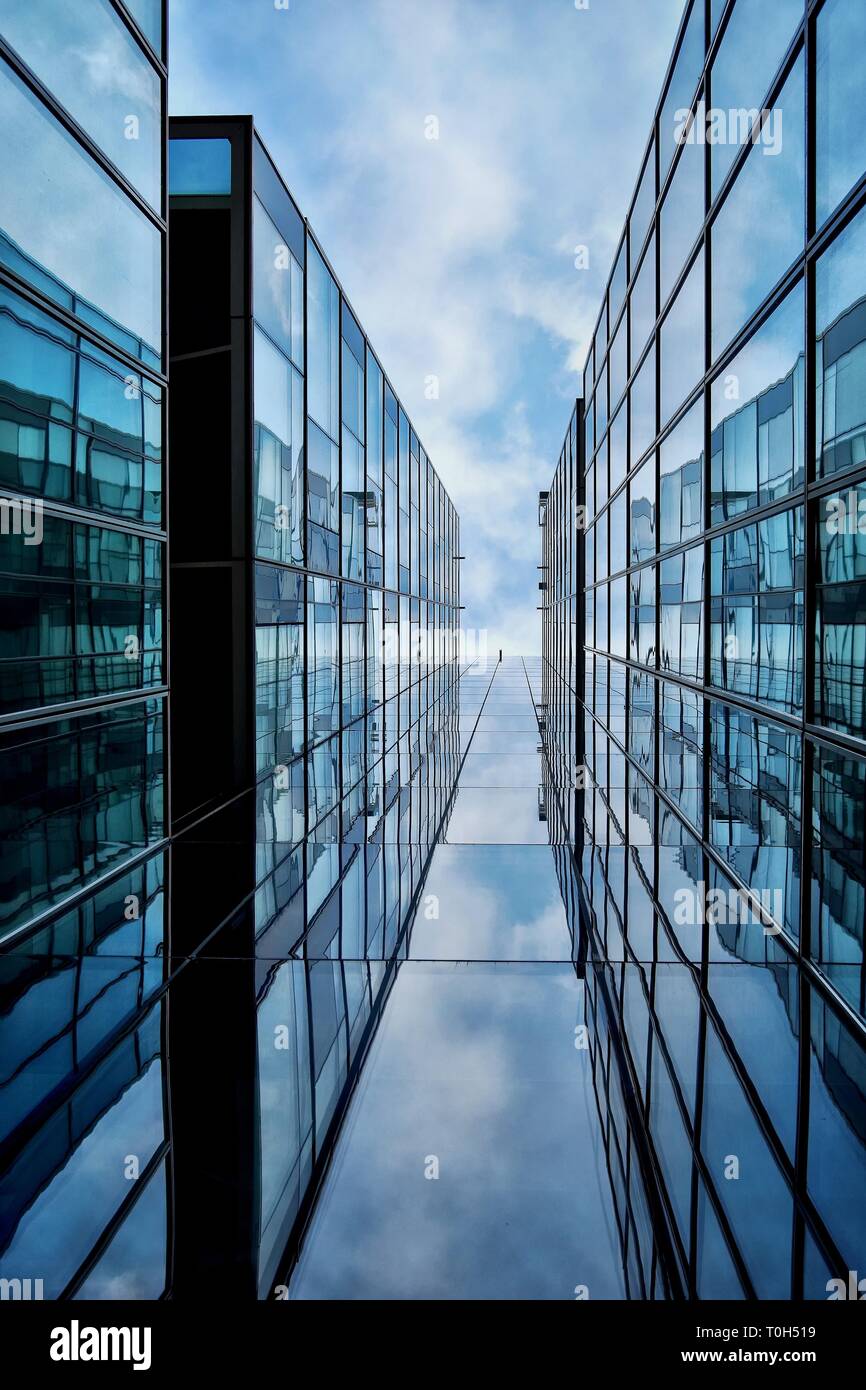Building facade with blue sky . Amazing perspective Stock Photo - Alamy