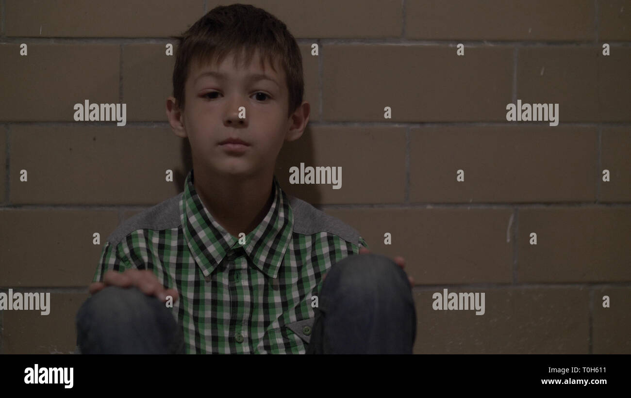 Sad boy teenager on floor hi-res stock photography and images - Alamy