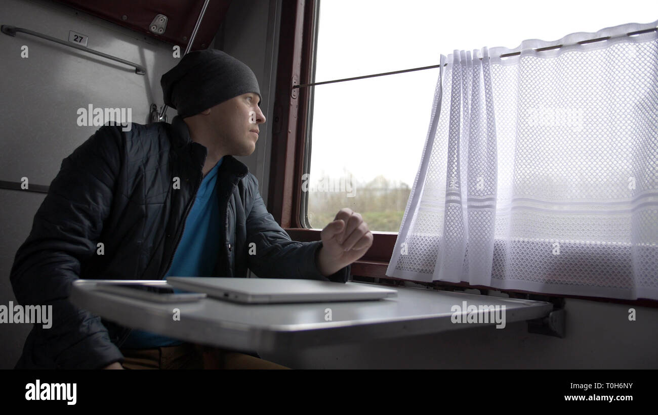 Man travelling train using hi-res stock photography and images - Alamy