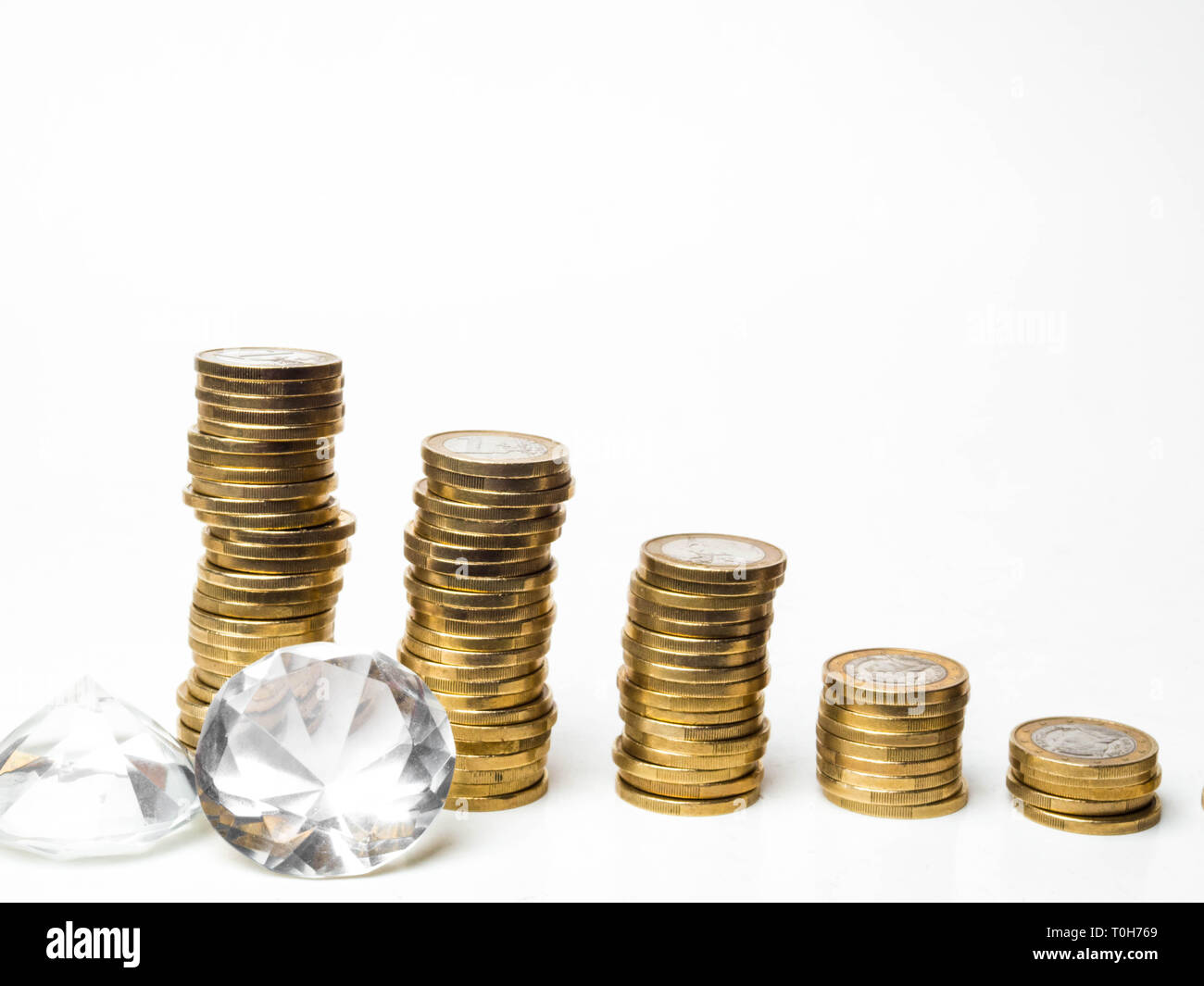 Diamond and Money Coins isolated on white background Stock Photo - Alamy