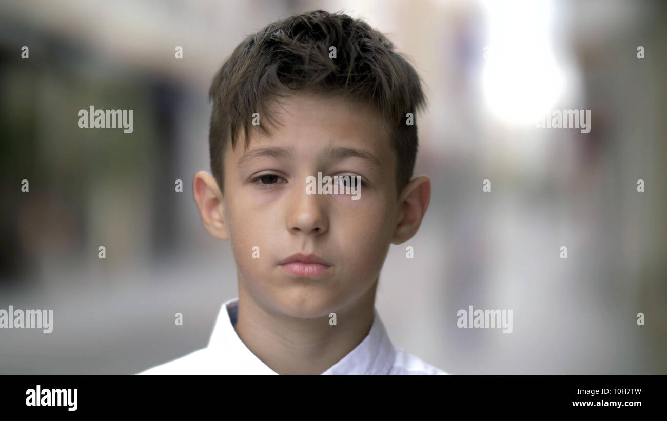 portrait of a funny boy looking at the camera Stock Photo - Alamy