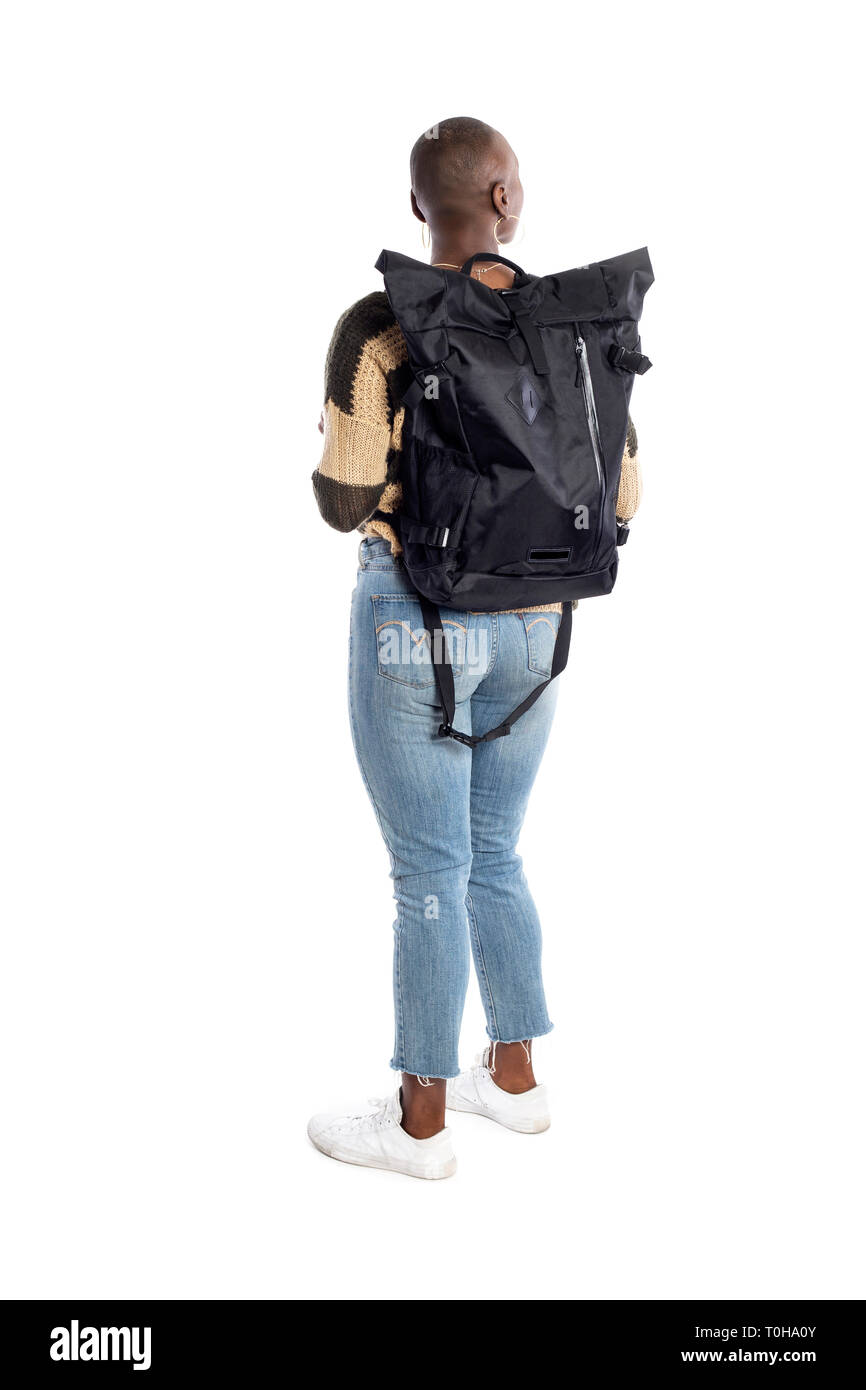 Black African American female wearing a backpack looking at white ...
