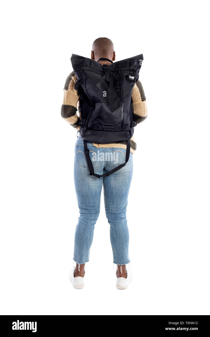 Black African American female wearing a backpack looking at white ...