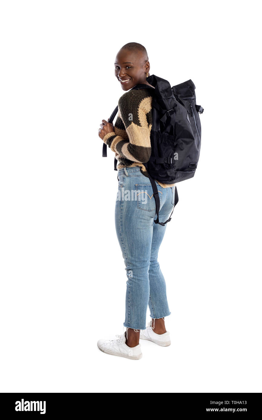 Black African American female wearing a backpack looking at white ...