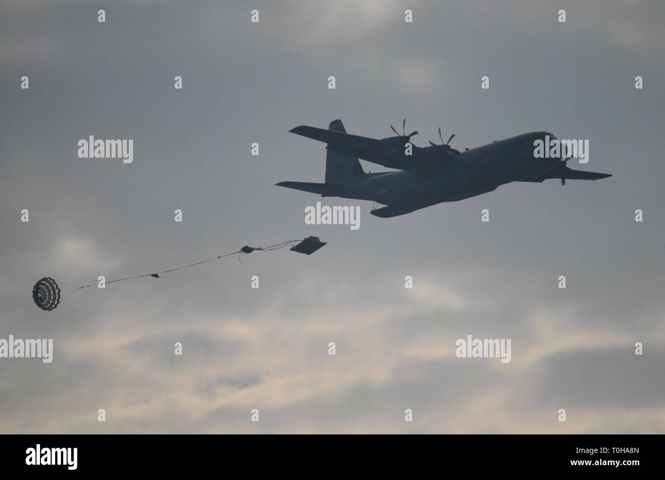 A C130J Super Hercules of 435th Contingency Response Group, parachutes ...