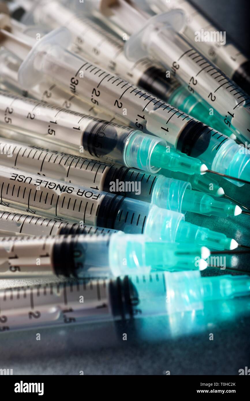 Stacked syringes hi-res stock photography and images - Alamy