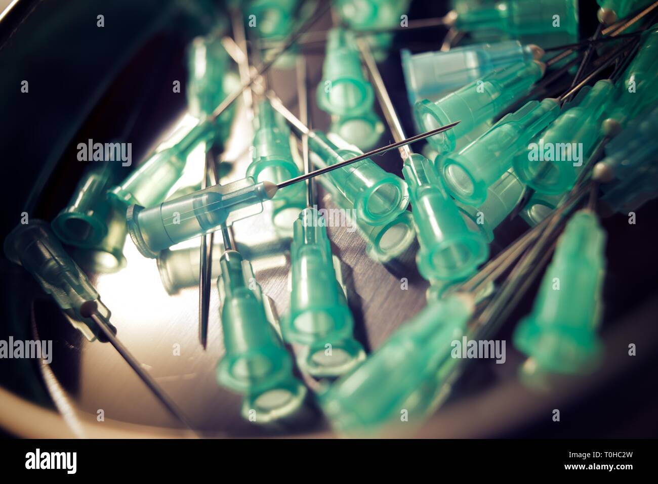 Group of needles for syringe on a metal tray Stock Photo - Alamy