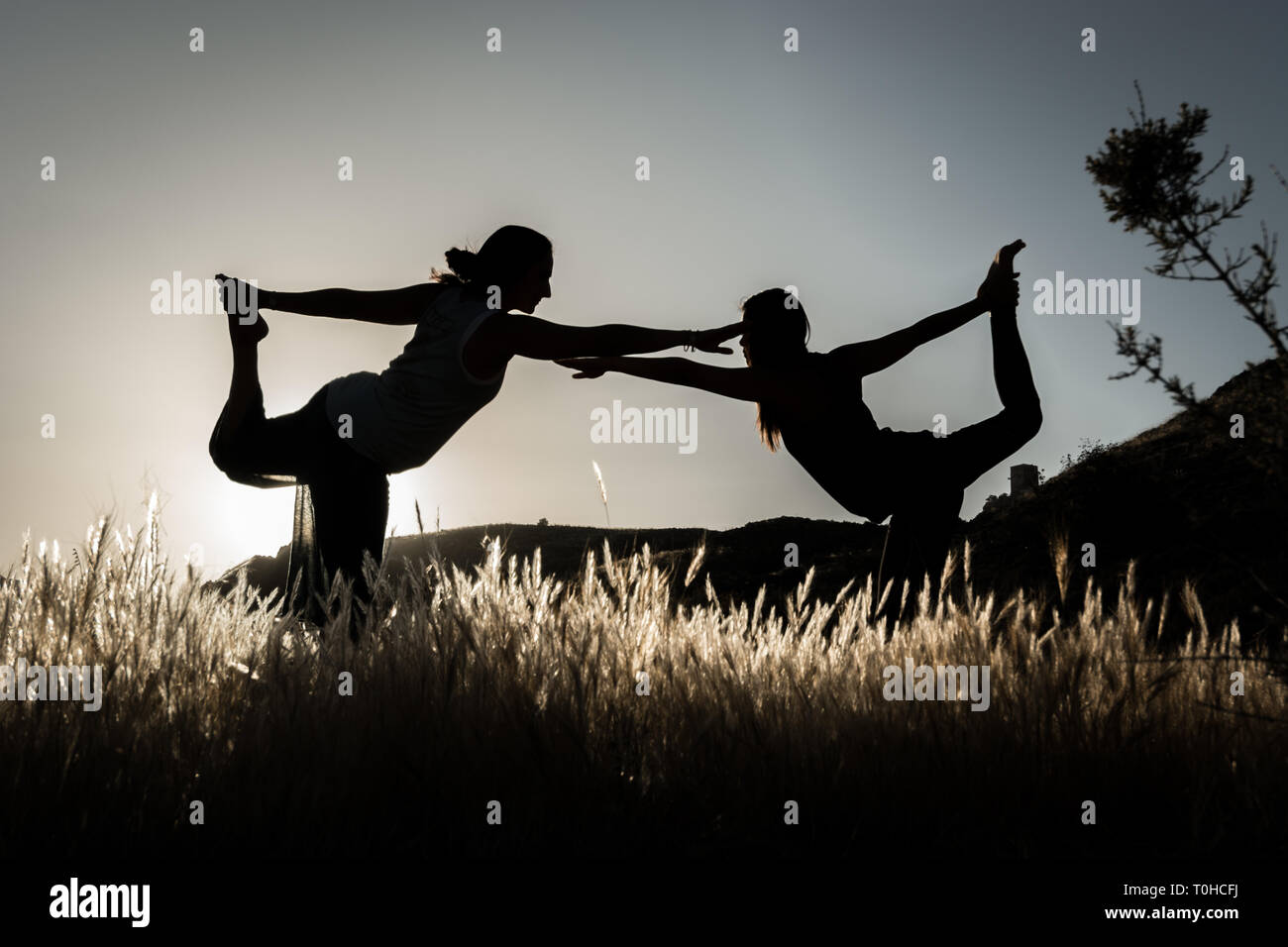 Yoga pose in silhouette hi-res stock photography and images - Alamy