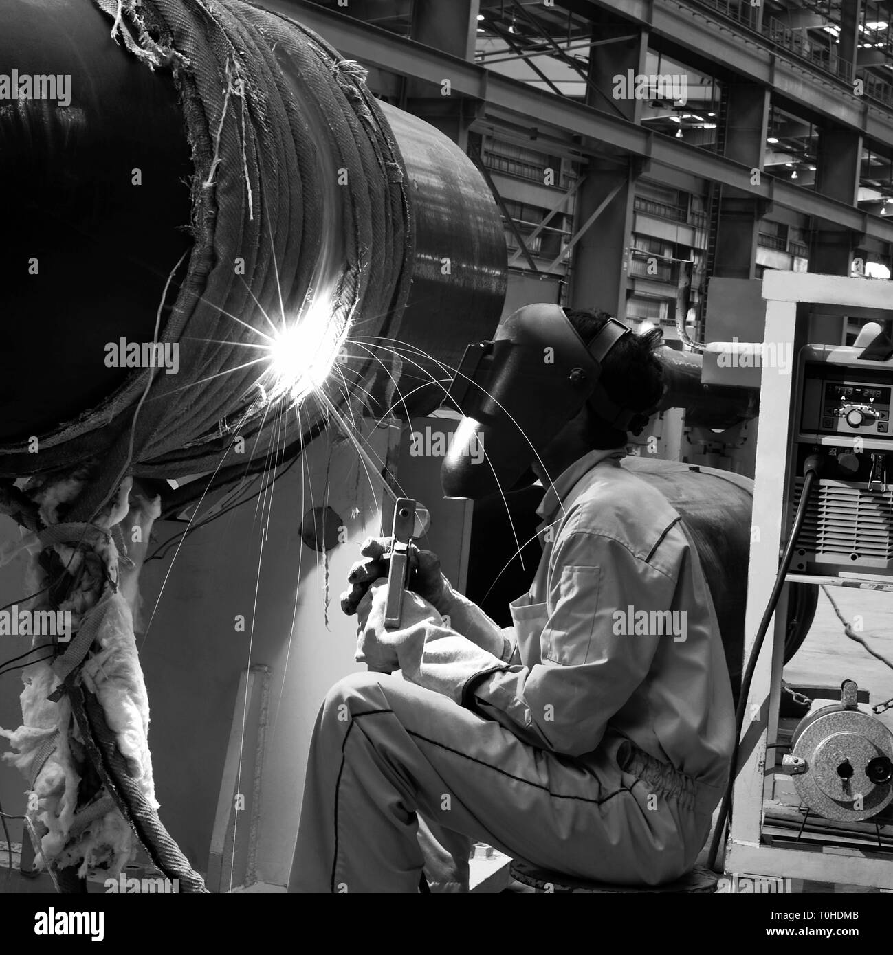 Wearing black mask hi-res stock photography and images - Alamy