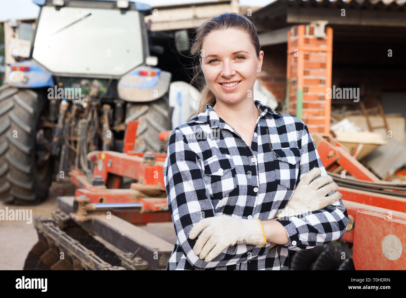 Woman driving tractor farm cabin hi-res stock photography and images ...