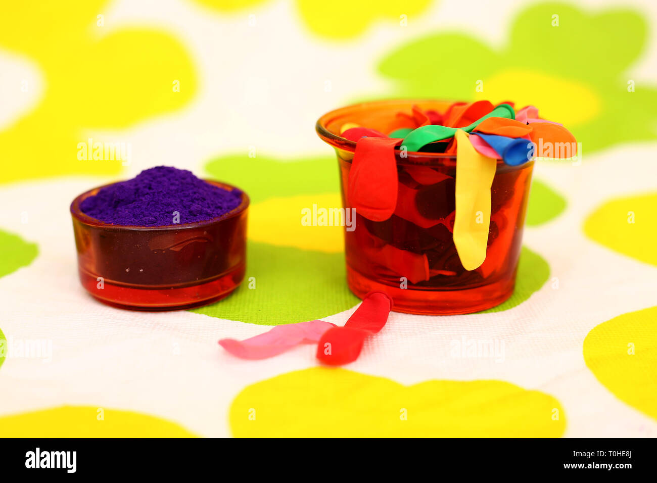 Picture of purple holi color with balloons for holi festival. Isolated ...