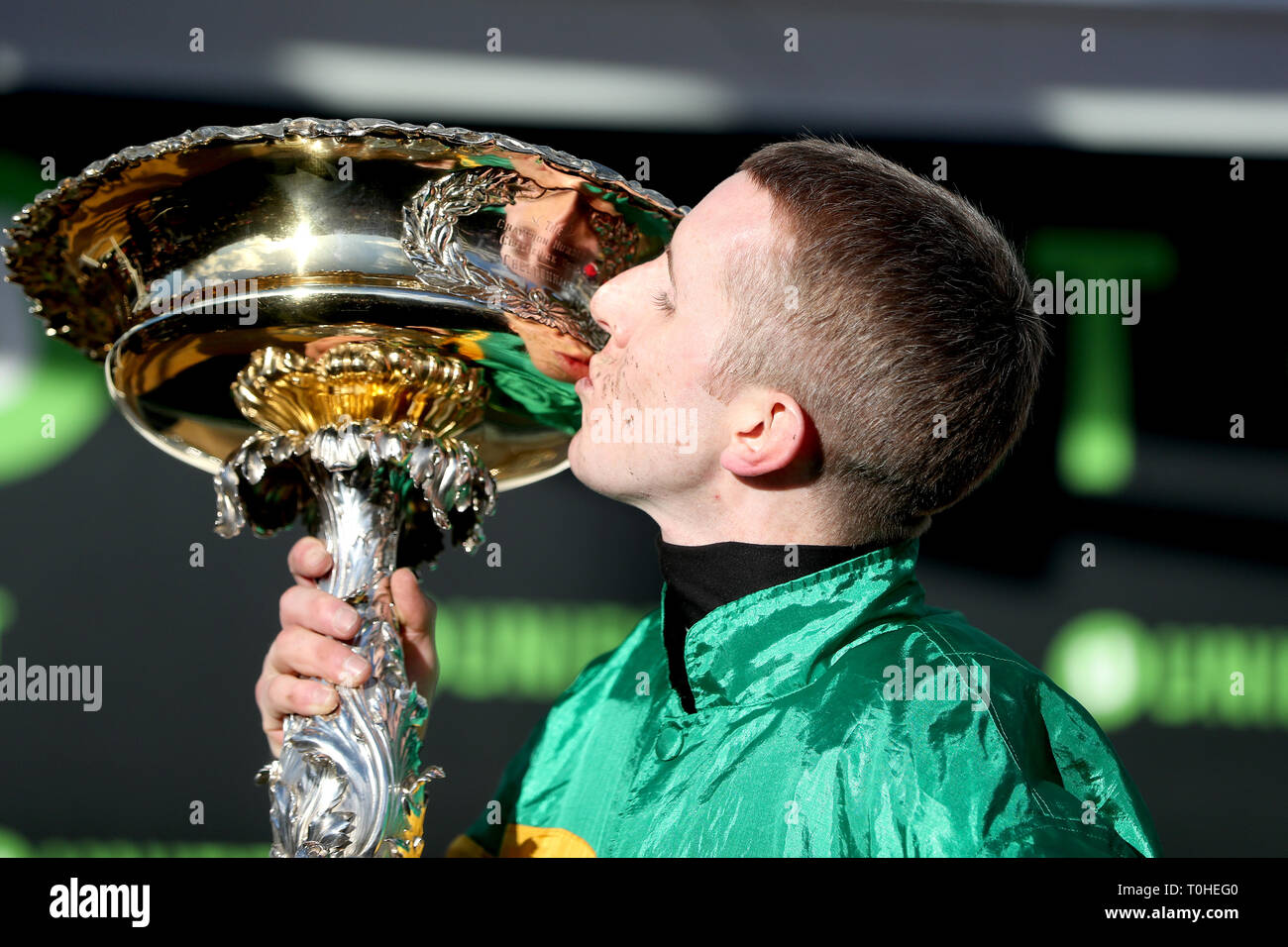 Jockey mark walsh kisses unibet champion hurdle challenge trophy hi-res ...