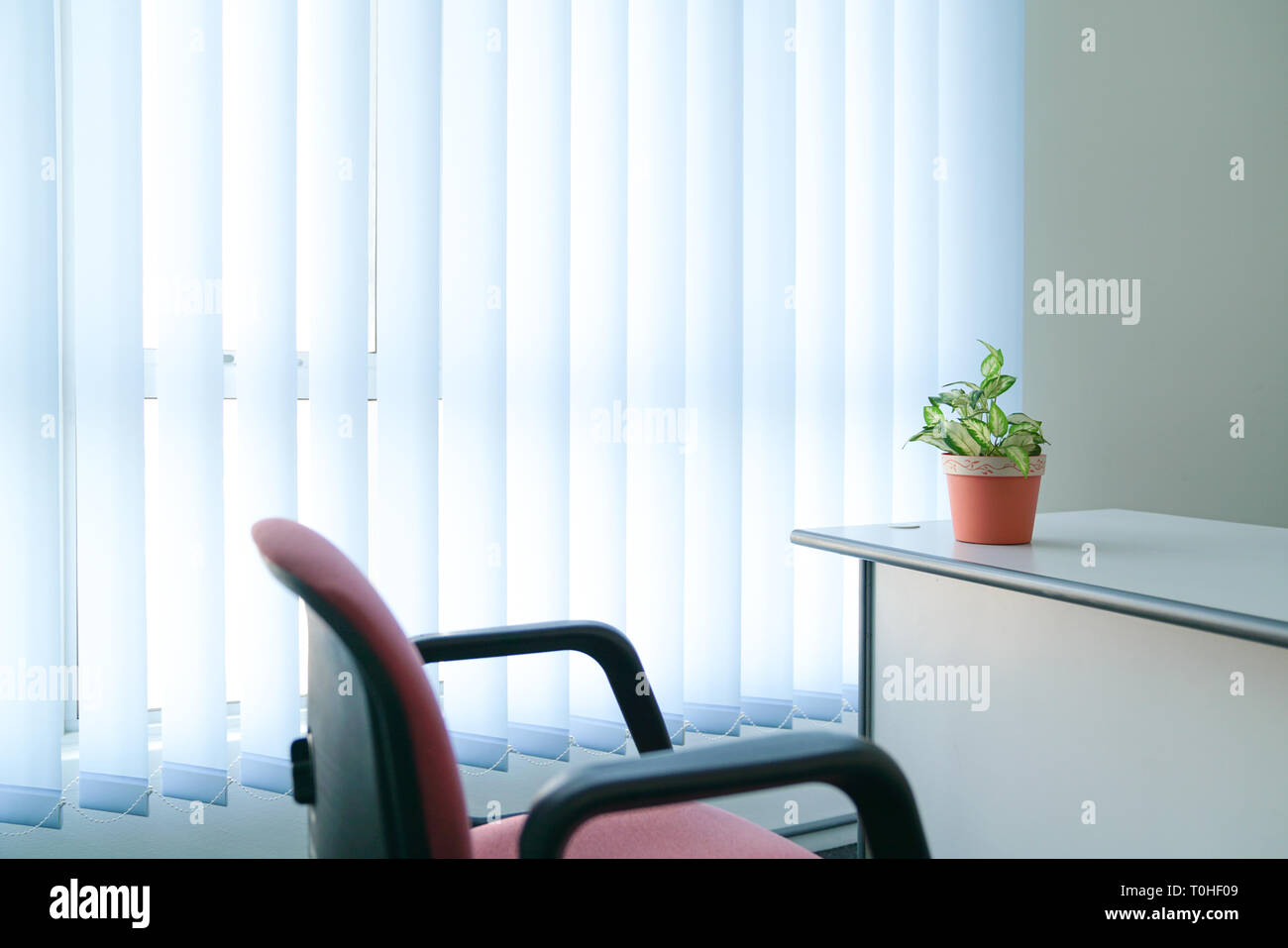 Clean and simple look of an office room or work place with copy space ...