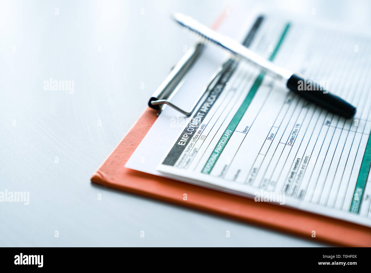 Seeking job concept, filling up the information in an employment ...