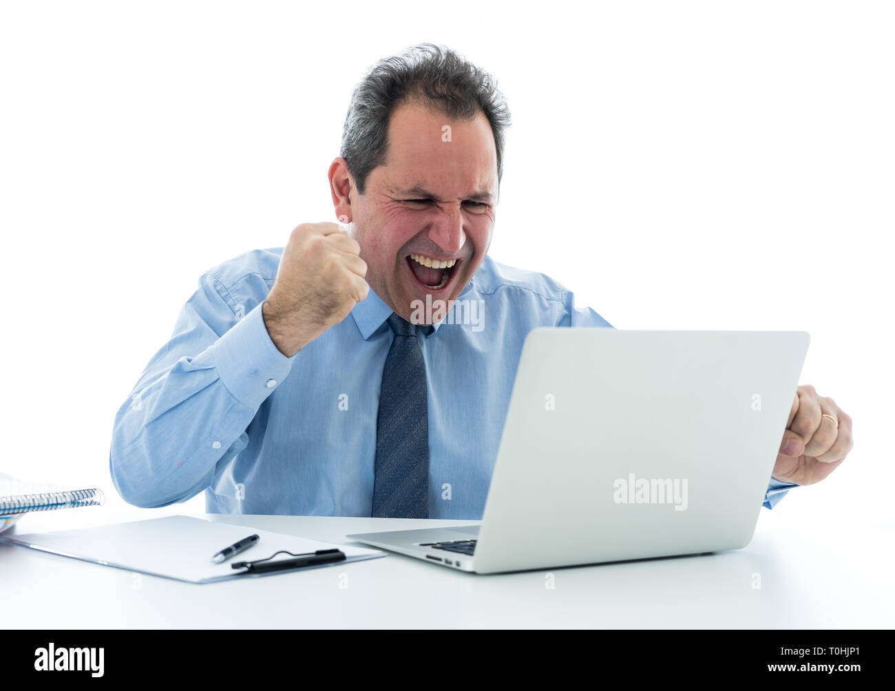 Angry and frustrated middle aged businessman overworked at desk upset ...