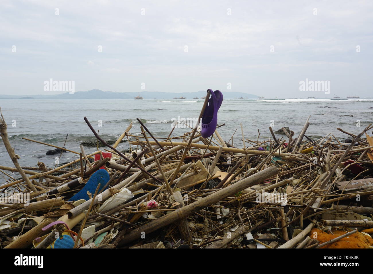 Polluted island beach Stock Photo - Alamy