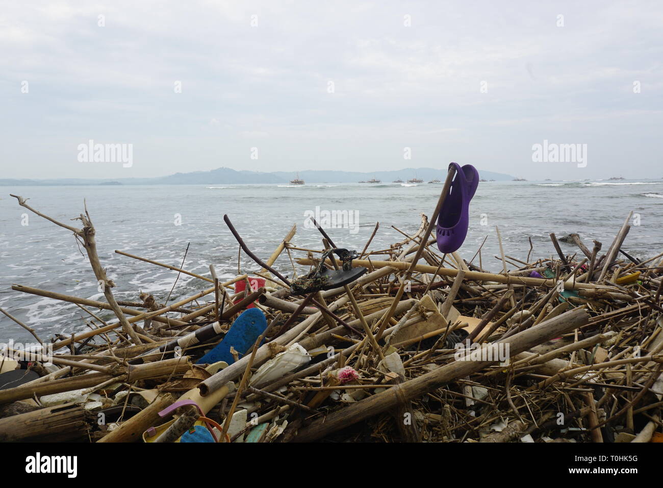 Polluted island beach Stock Photo - Alamy