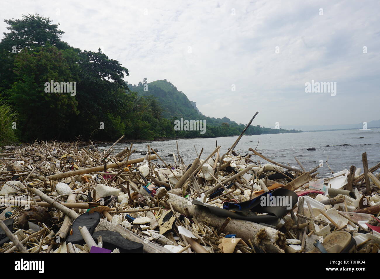 Polluted island beach Stock Photo - Alamy