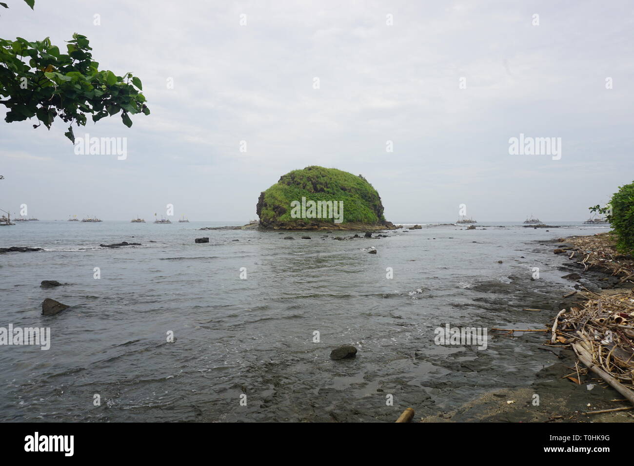 Polluted island beach Stock Photo - Alamy
