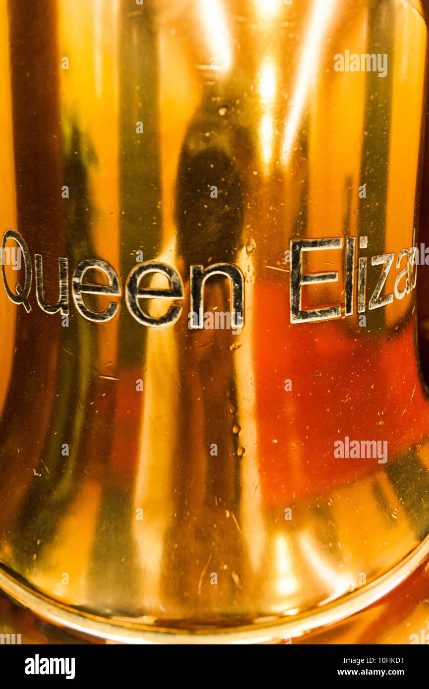 Ship's bell on display. Cunard Liner QE2 Stock Photo - Alamy