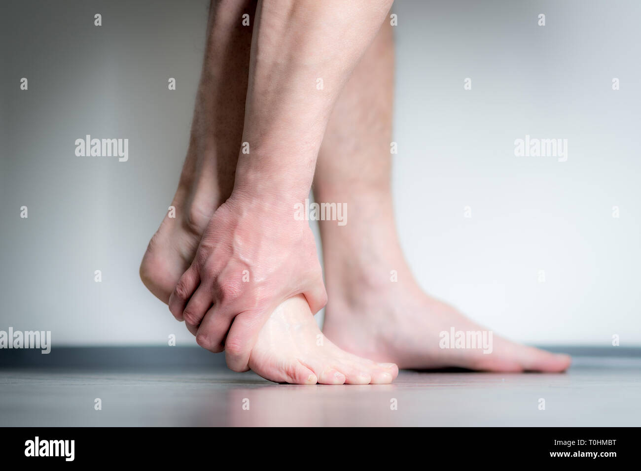 Painful feet hi-res stock photography and images - Alamy