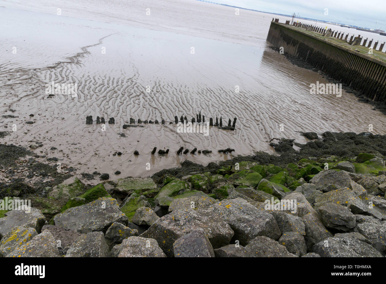 Remains of a ship wrecked on the rocks Stock Photo - Alamy