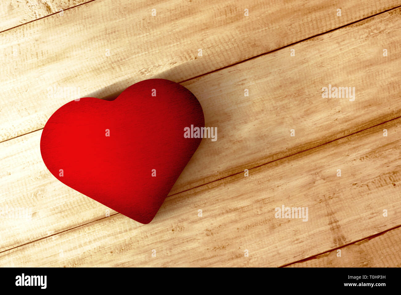 Red heart on the wooden table with space for copyspace. Health day ...