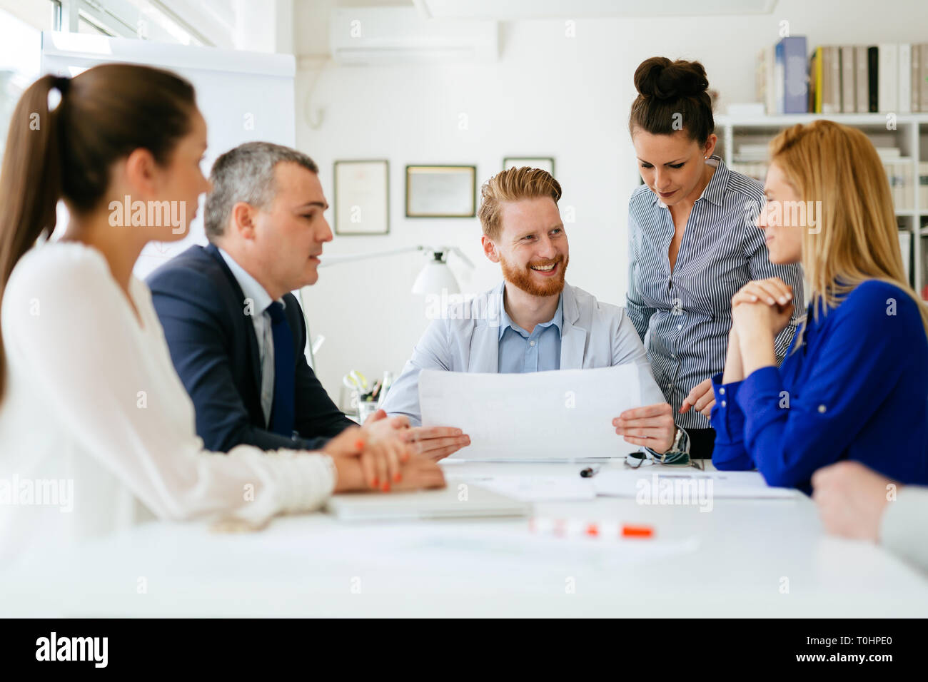 Sitting working group discussion hi-res stock photography and images ...