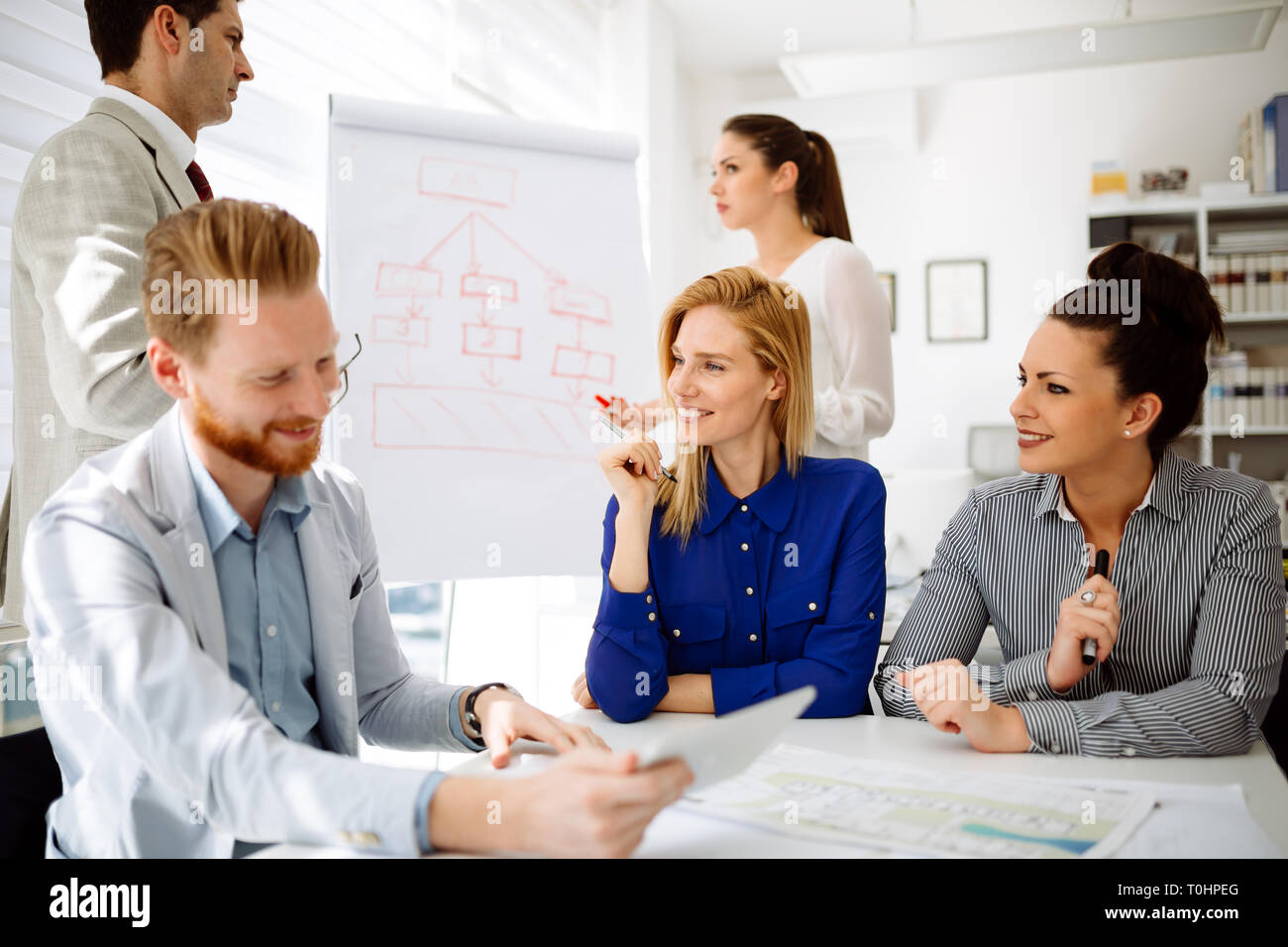 Happy business people in office Stock Photo - Alamy