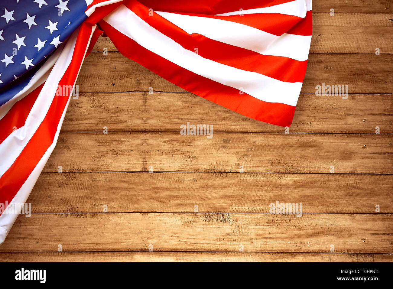 USA Flag folded with wooden background. Wooden for copyspace Stock ...