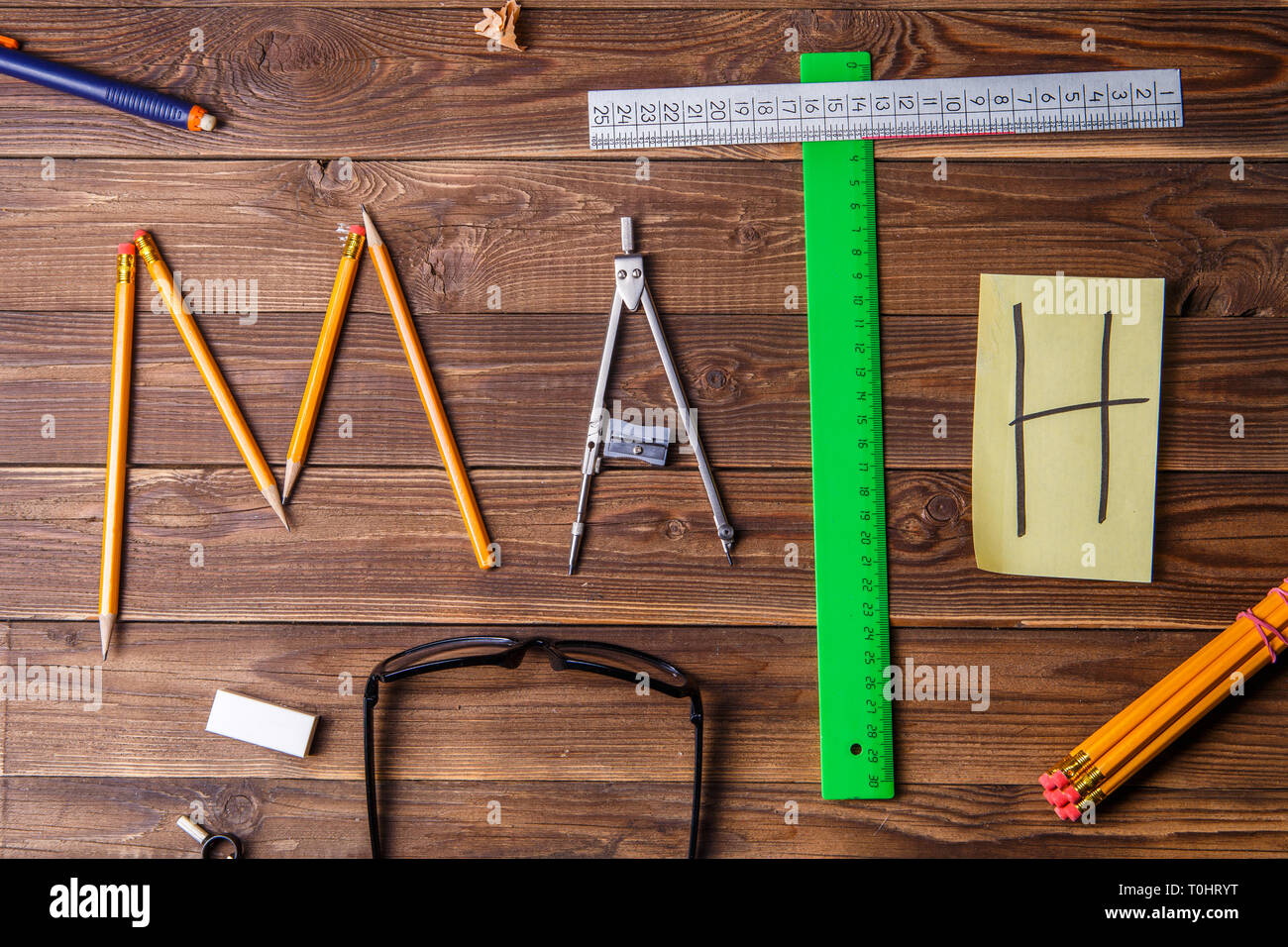 Text math composed of pencils, rulers, circular, sharpener and sticker ...