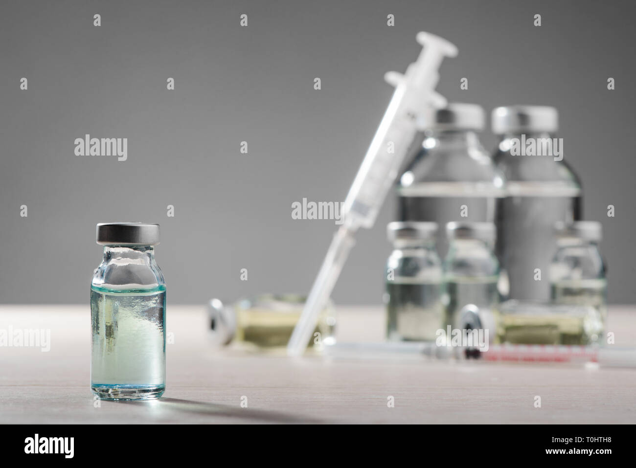 Vial of blue liquid Stock Photo - Alamy