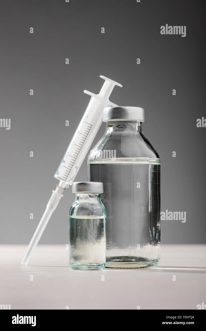 Syringe, vial and bottle Stock Photo - Alamy
