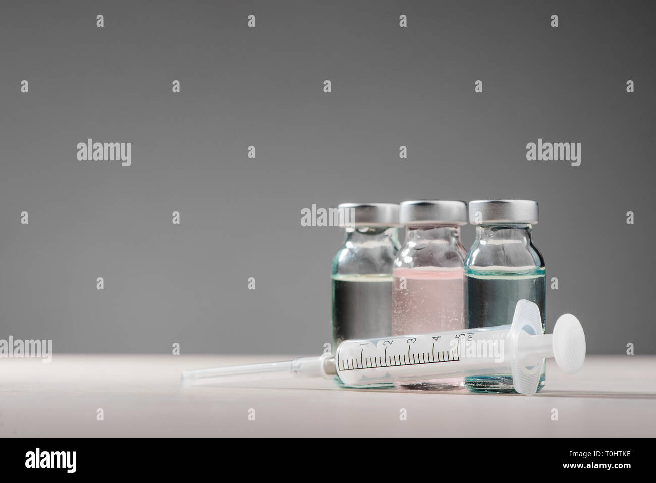 Three vials of medications Stock Photo - Alamy