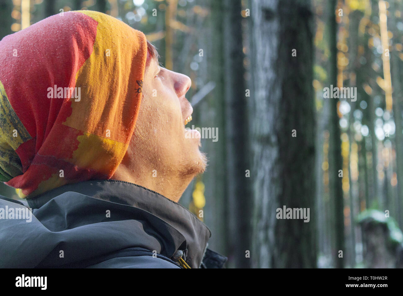 Man laughs in the morning in the forest. Happy spring sun Stock Photo ...